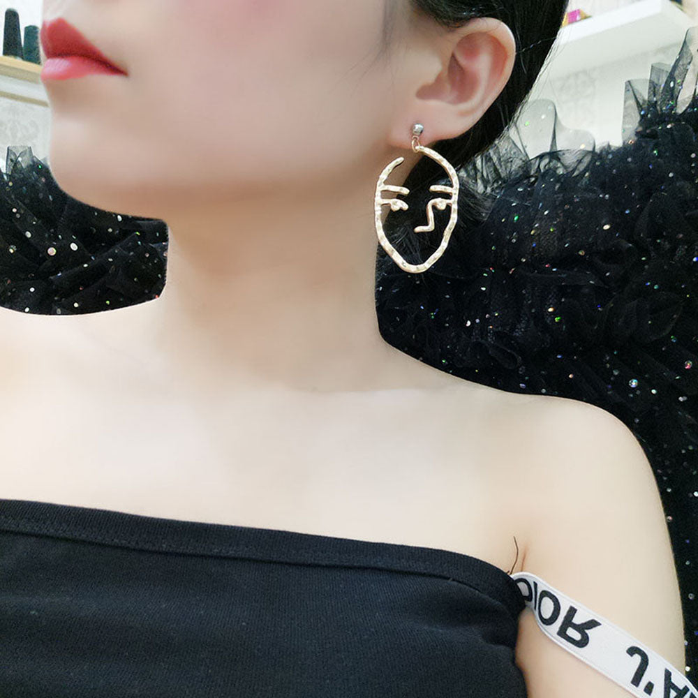 Zen Hammered Metal Artistic Modern Portrait Face Dangle Earrings ...